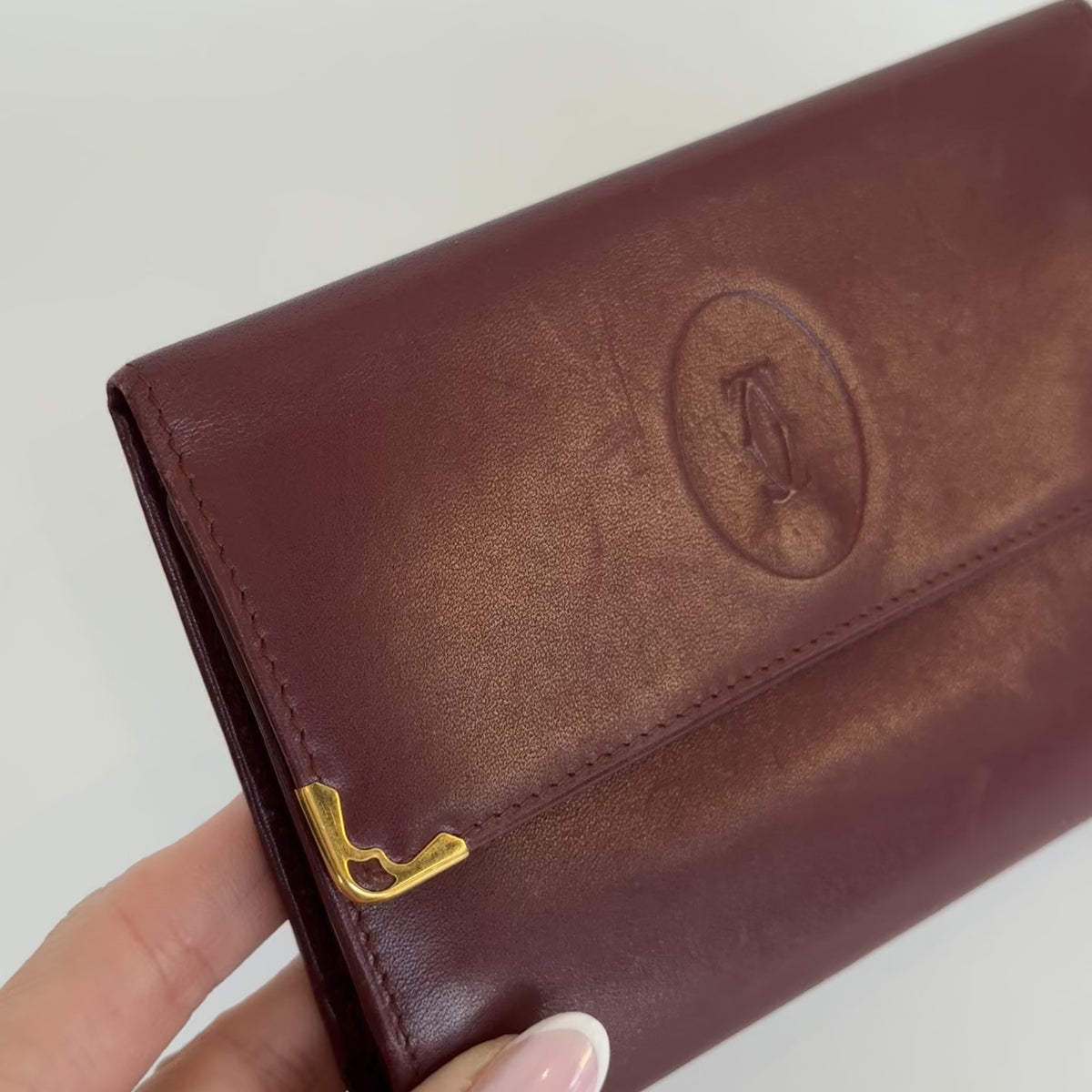 Cartier Paris Logo Kiss Lock Burgundy Tri Fold Wallet | QUEEN MAY